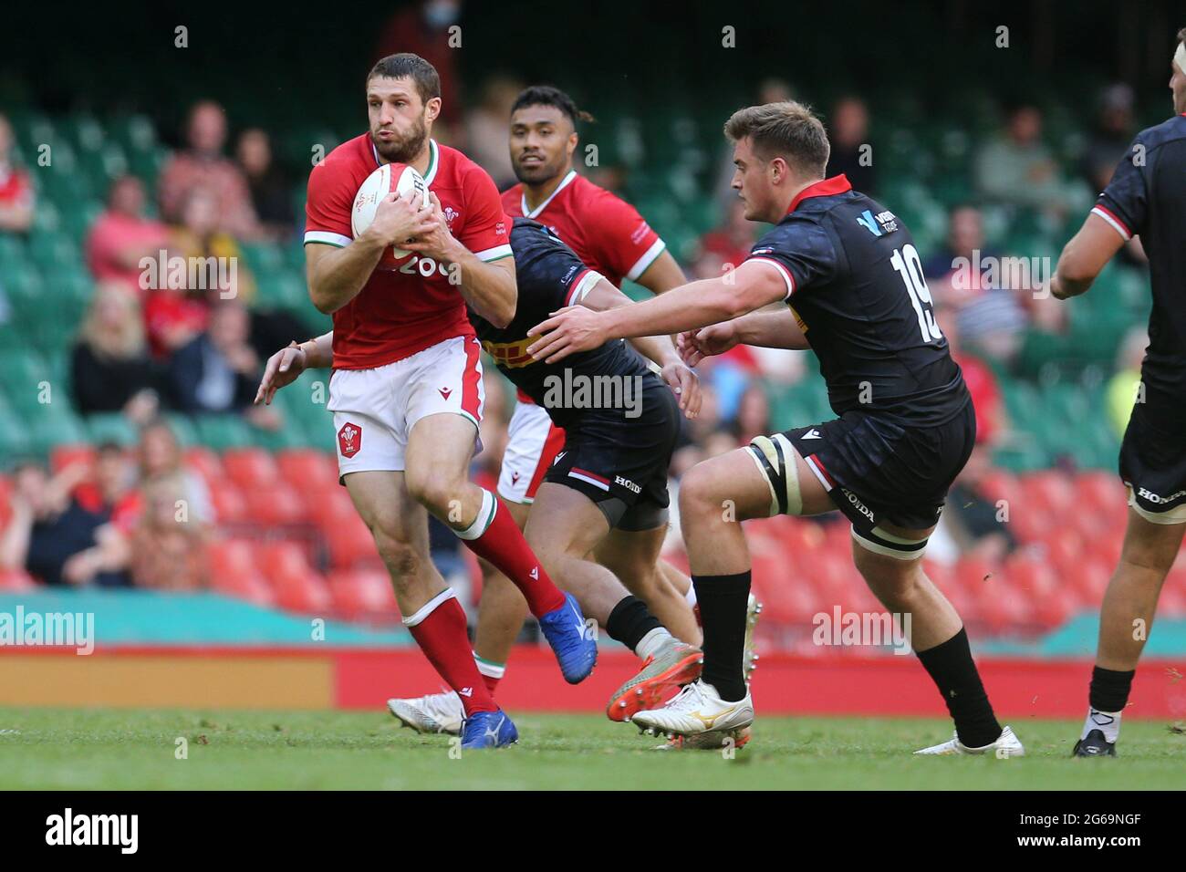 Cardiff, UK. 03rd July, 2021. Jonah Holmes of Wales in action (l).Rugby ...