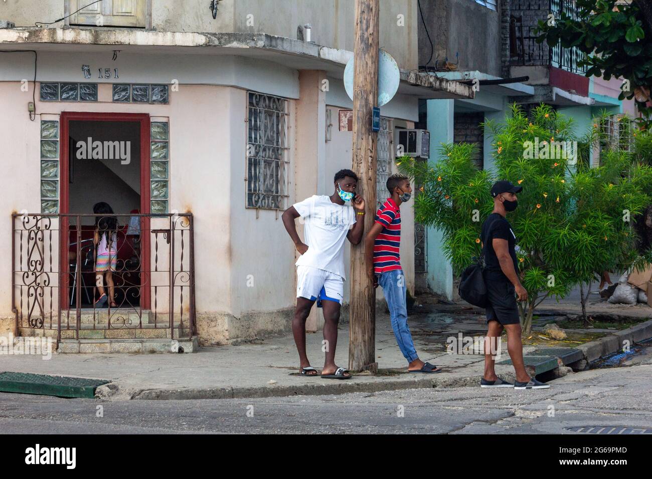 Cuban youth making nothing in a corner of Santiago de Cuba city, Cuba ...