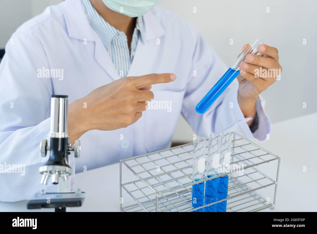 Scientist wear lab coat and protective wear are working with research ...