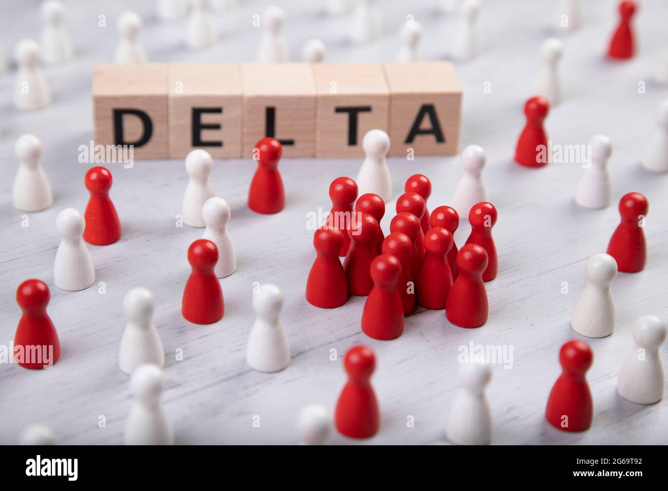 wooden blocks with the word delta surrounded by white and red wooden ...