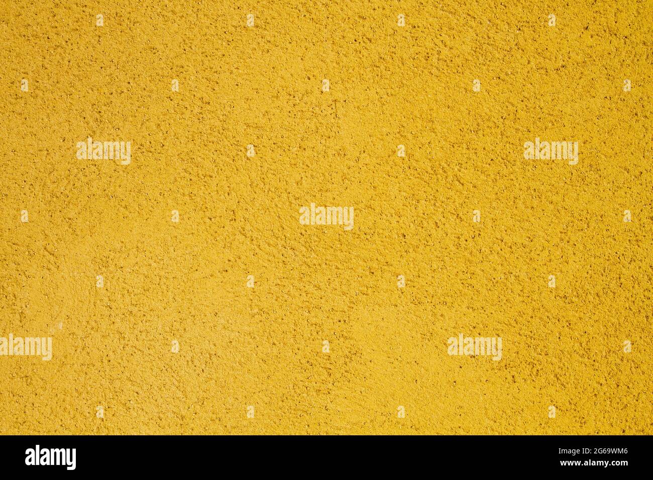 Yellow painted concrete wall texture or background Stock Photo - Alamy