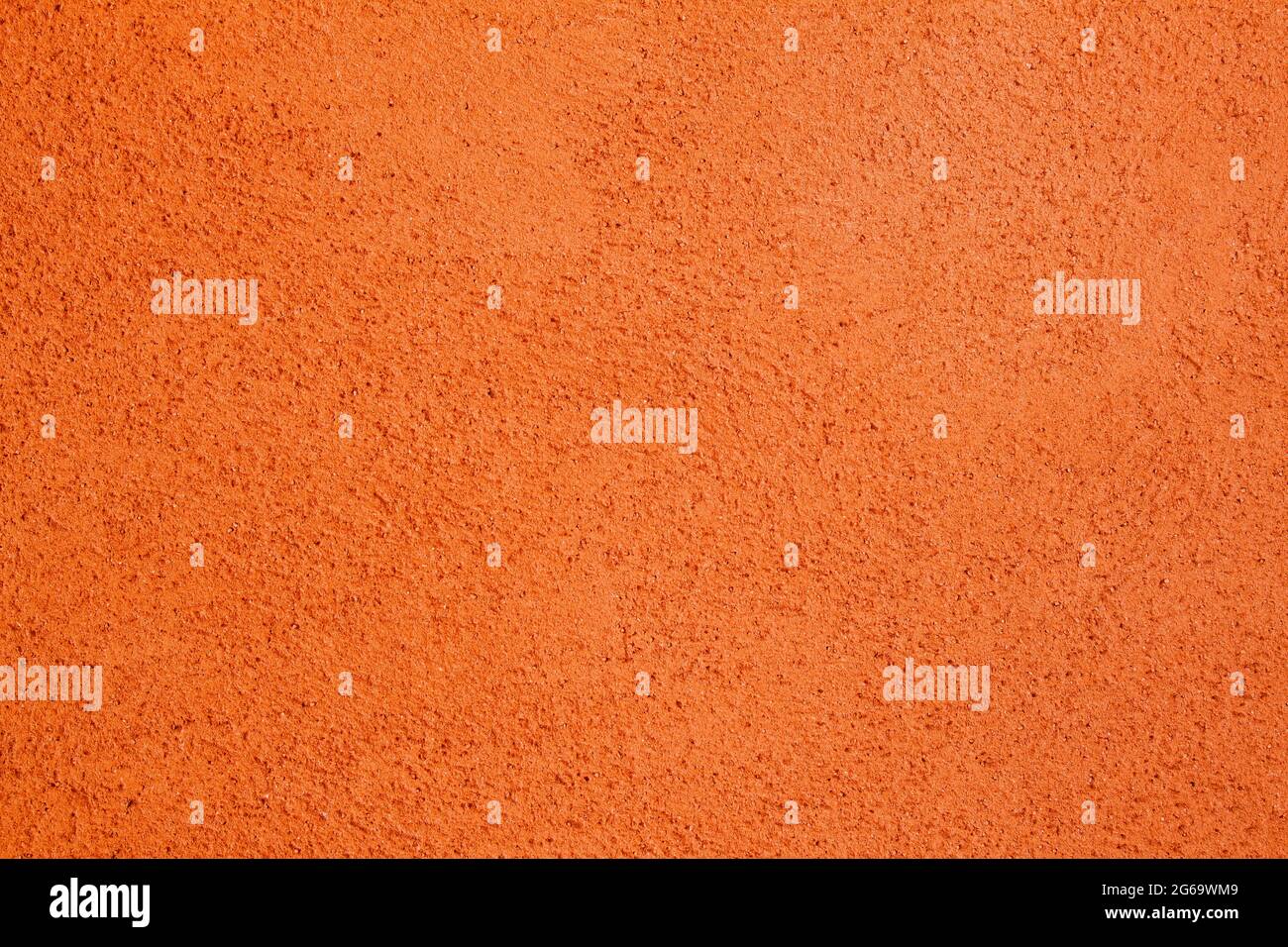Orange colored plaster finish wall texture or background Stock Photo ...
