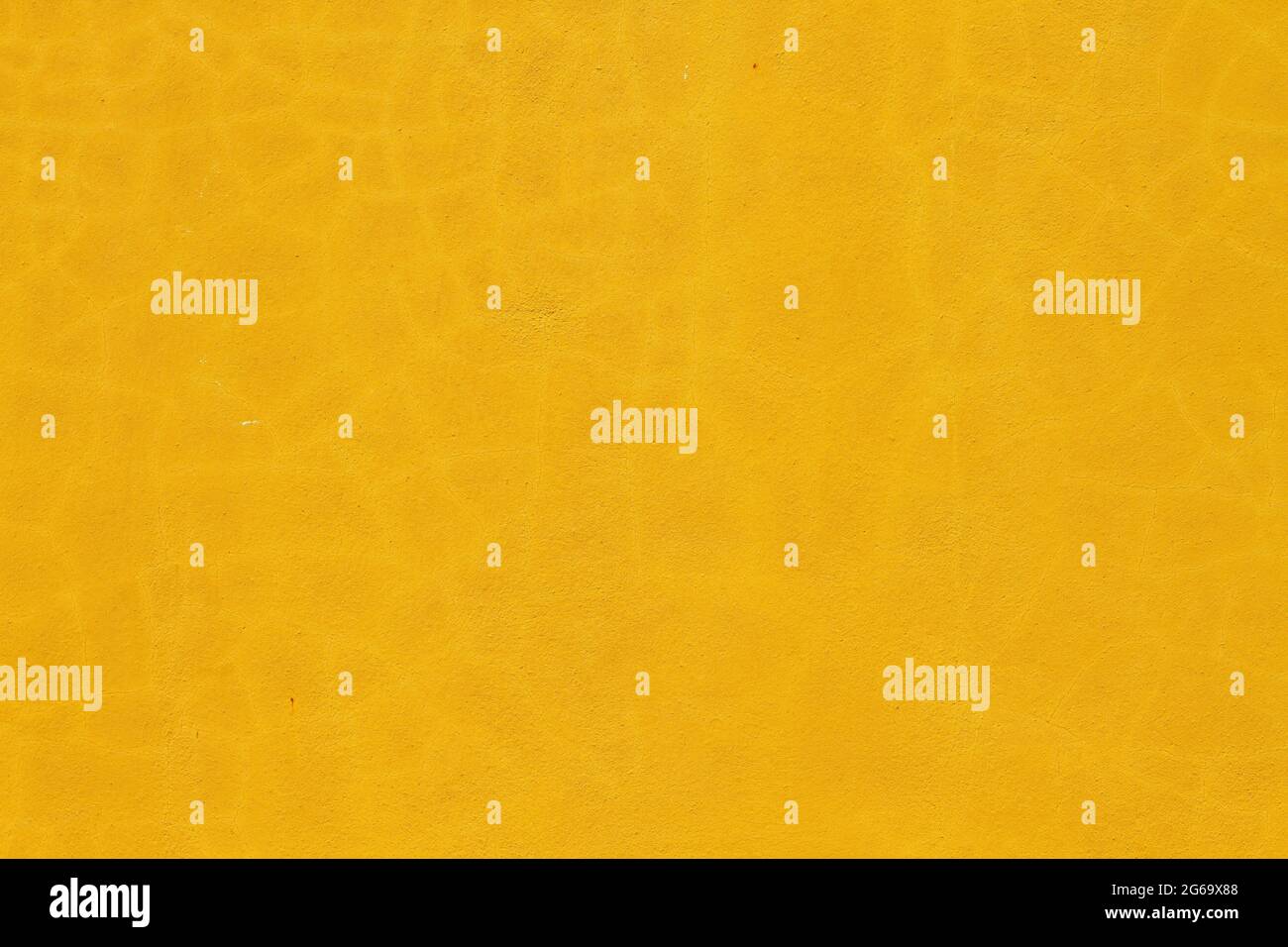 Yellow painted concrete wall texture or background Stock Photo - Alamy