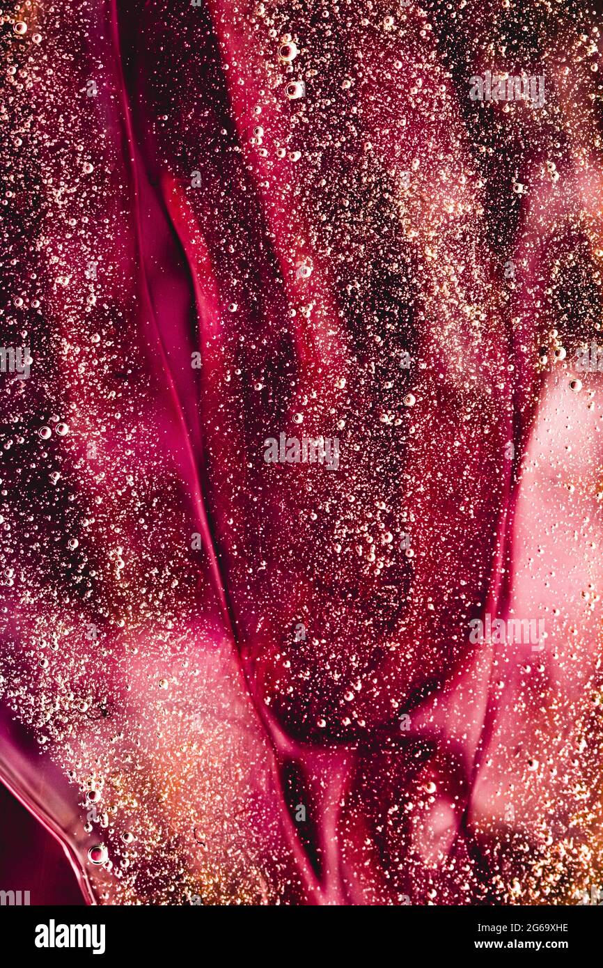 Abstract red liquid background, paint splash, swirl pattern and water ...