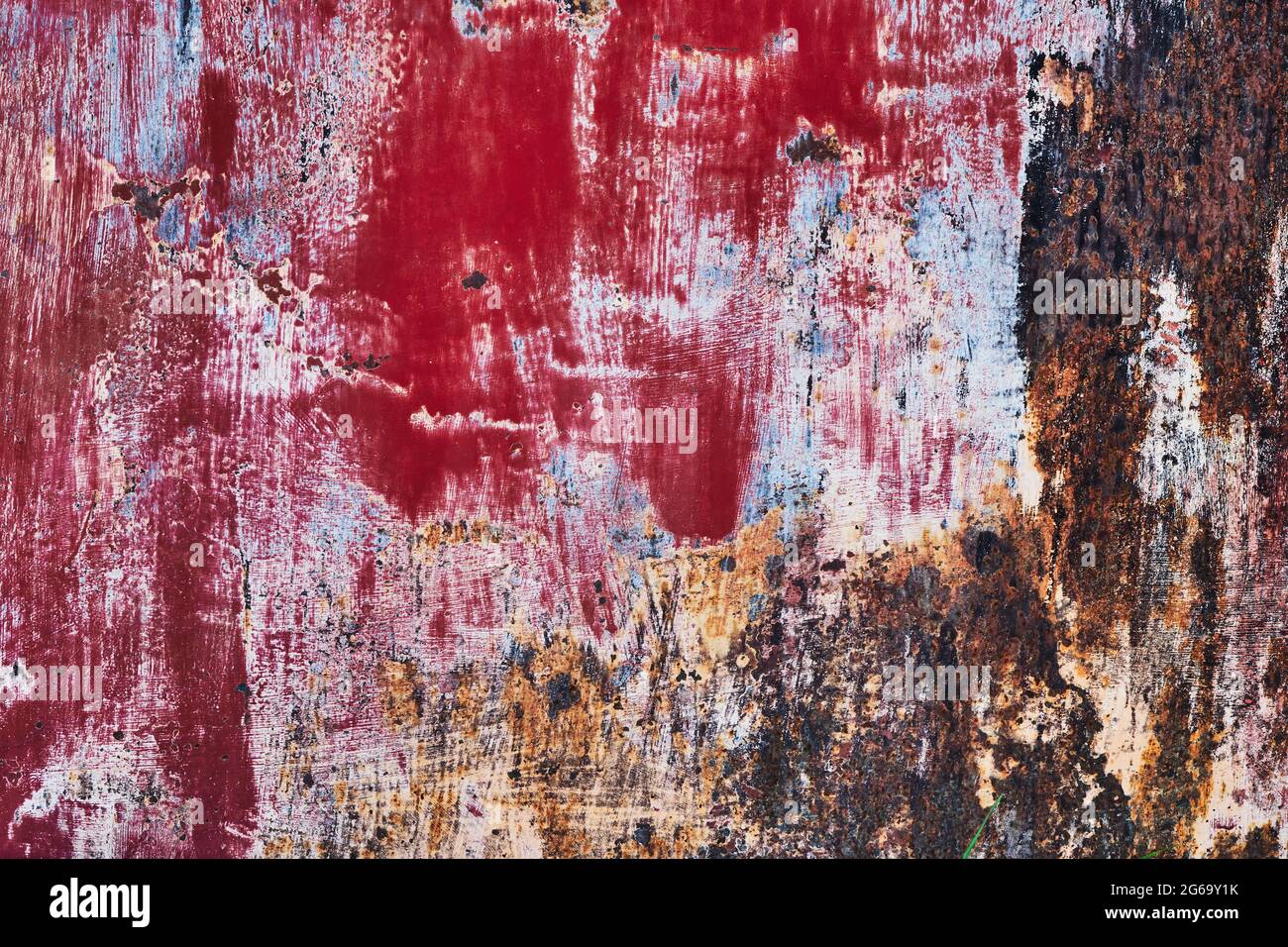 Old corroded metal with worn out red peeling paint, grunge background ...