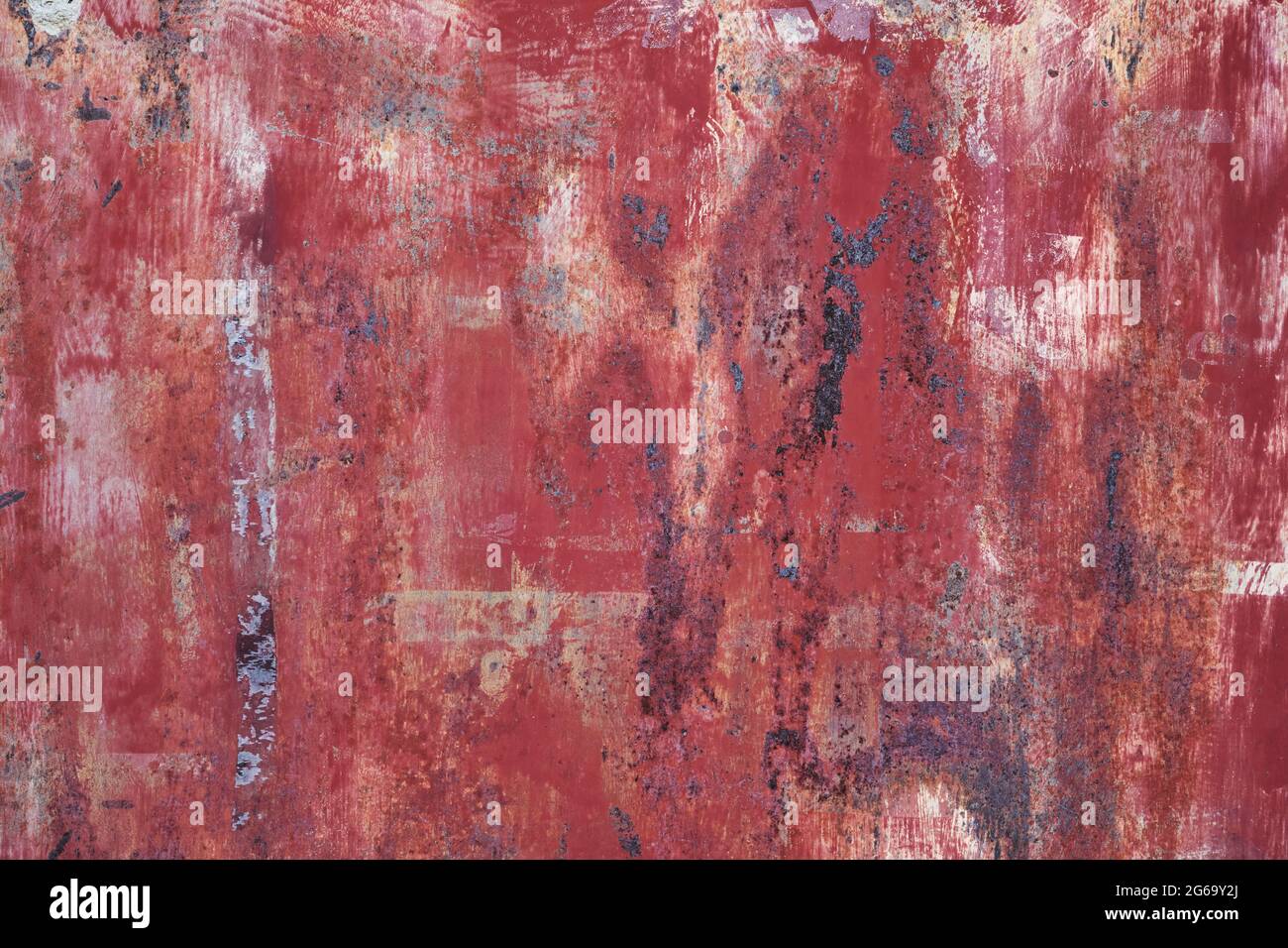 Old corroded metal with worn out red peeling paint, grunge background ...