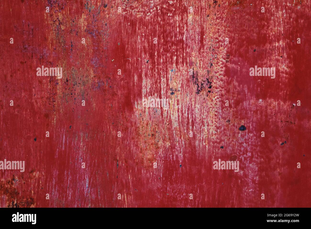 Old corroded metal with worn out red peeling paint, grunge background ...