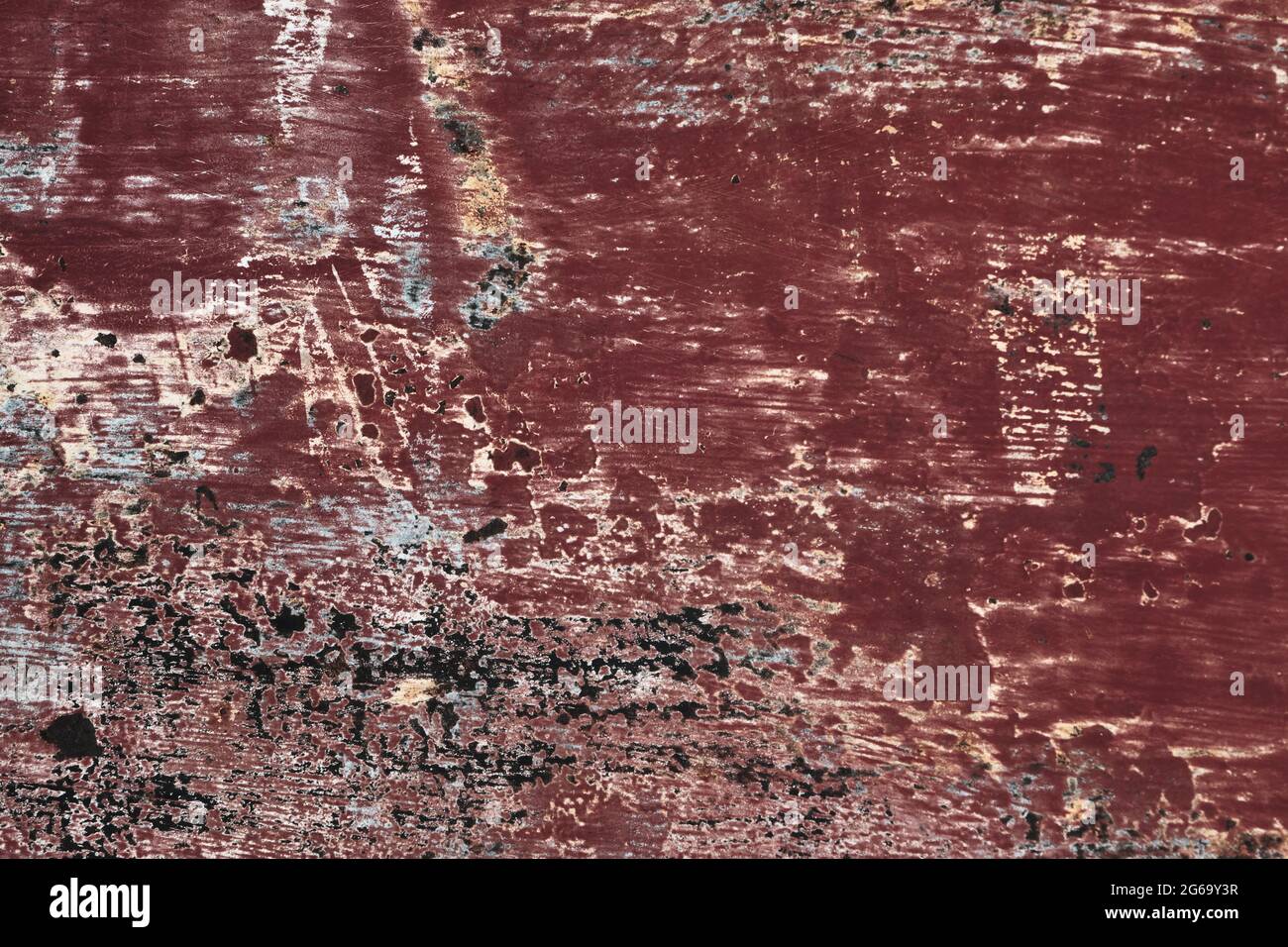 Old corroded metal with worn out red peeling paint, grunge background ...