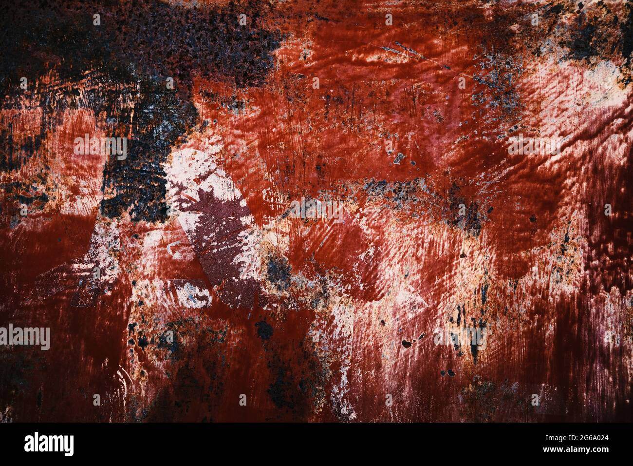 Old corroded metal with worn out red peeling paint, grunge background ...