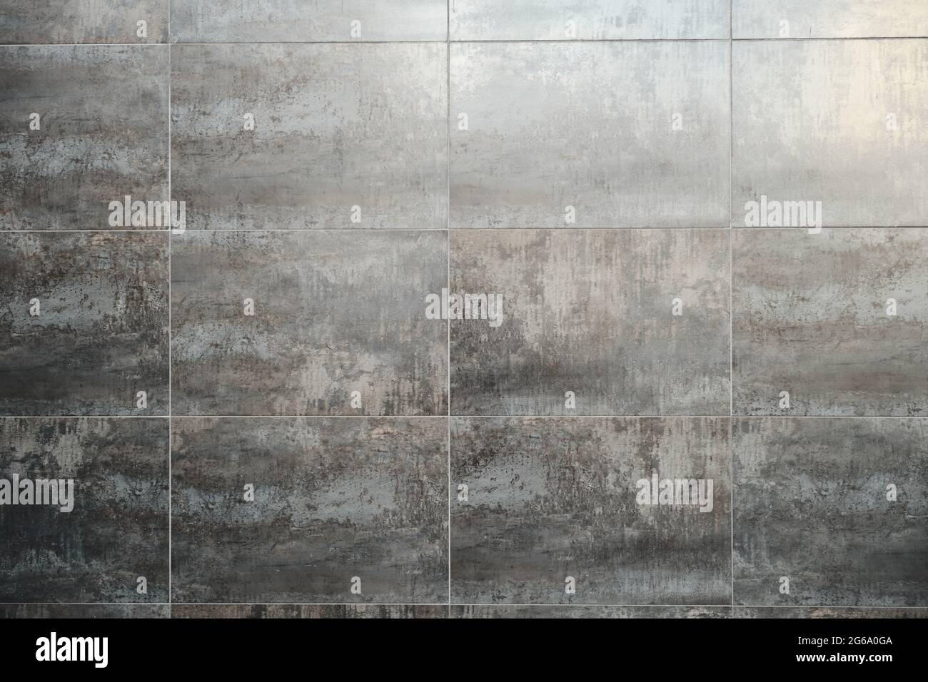 Modern distressed tiled wall with oxidized effect and texture Stock ...