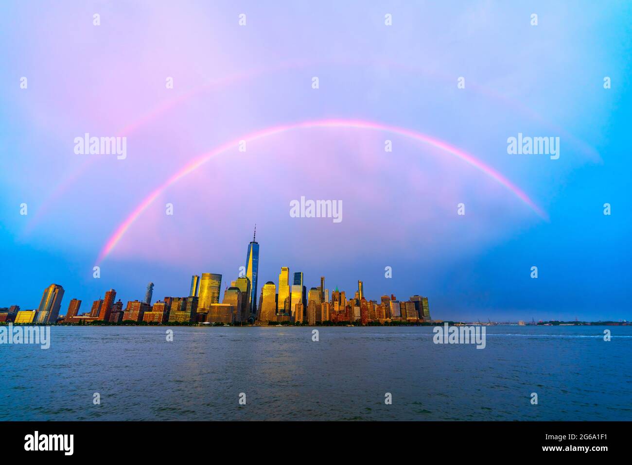 Rainbow Appears Over The Lower Manhattan Skyscraper NYC Stock Photo - Alamy