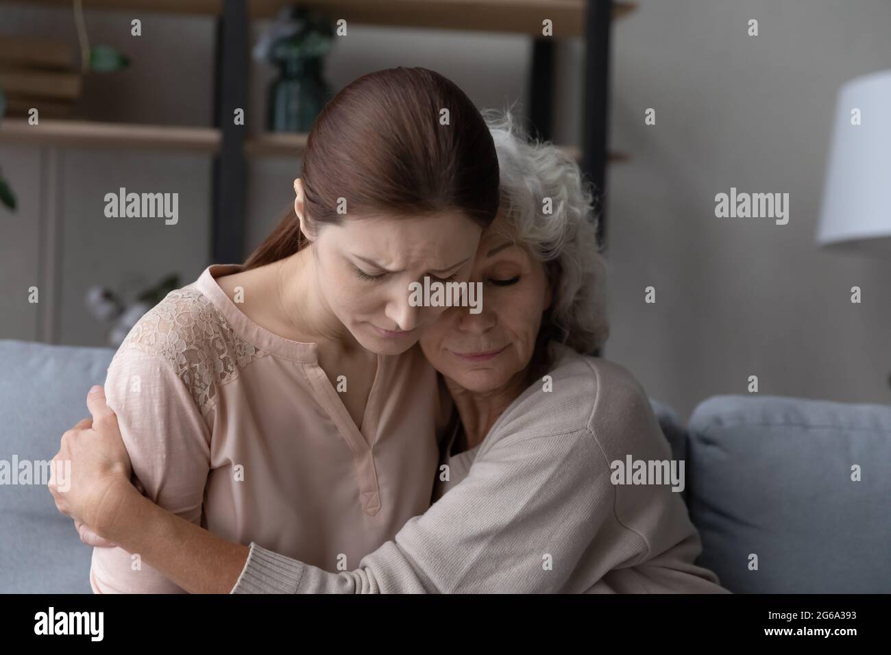 Old lady mom support comfort embrace beloved grownup daughter girl ...