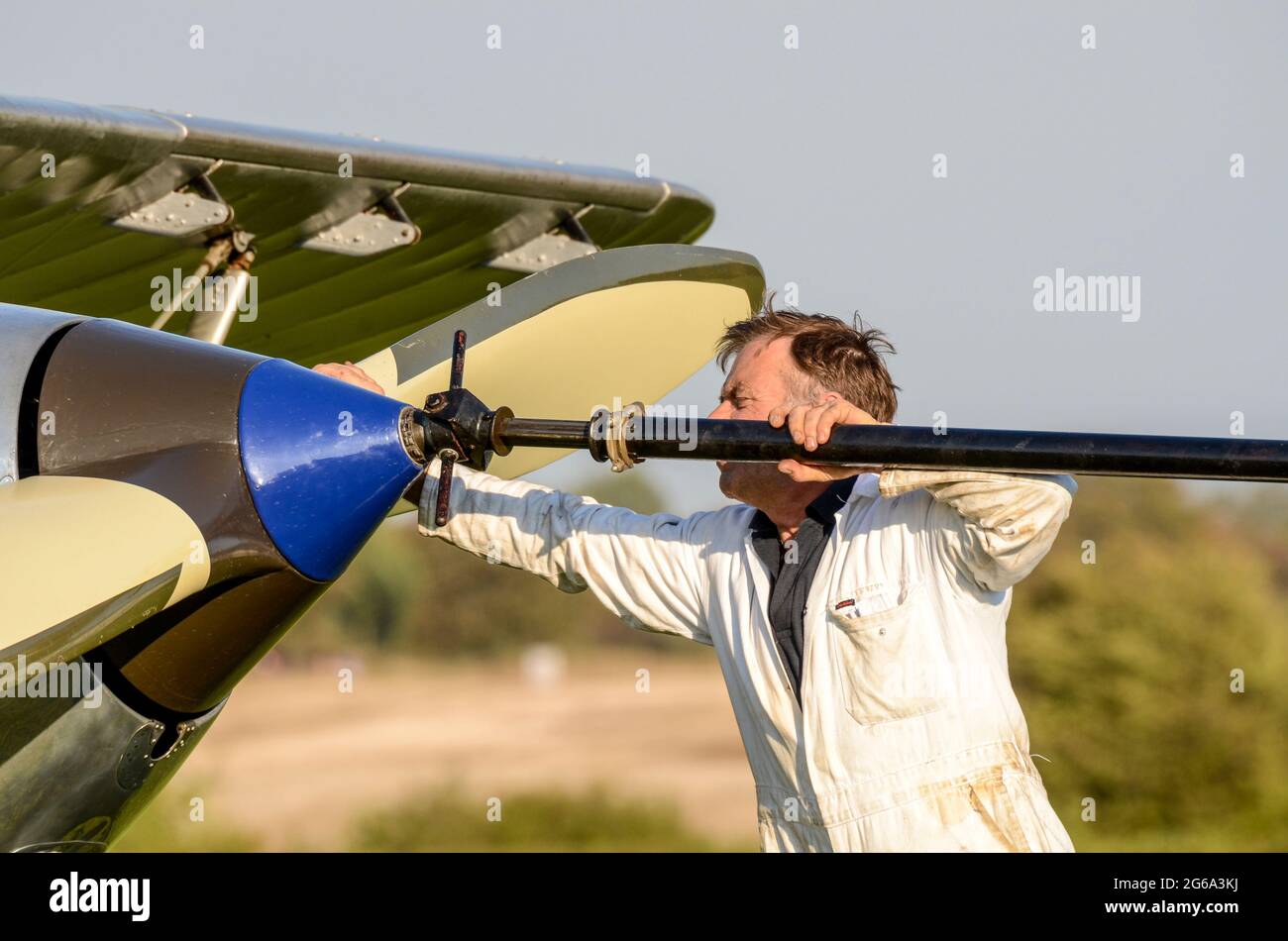Hucks starter being attached to Hawker Hind vintage biplane K5414 ...