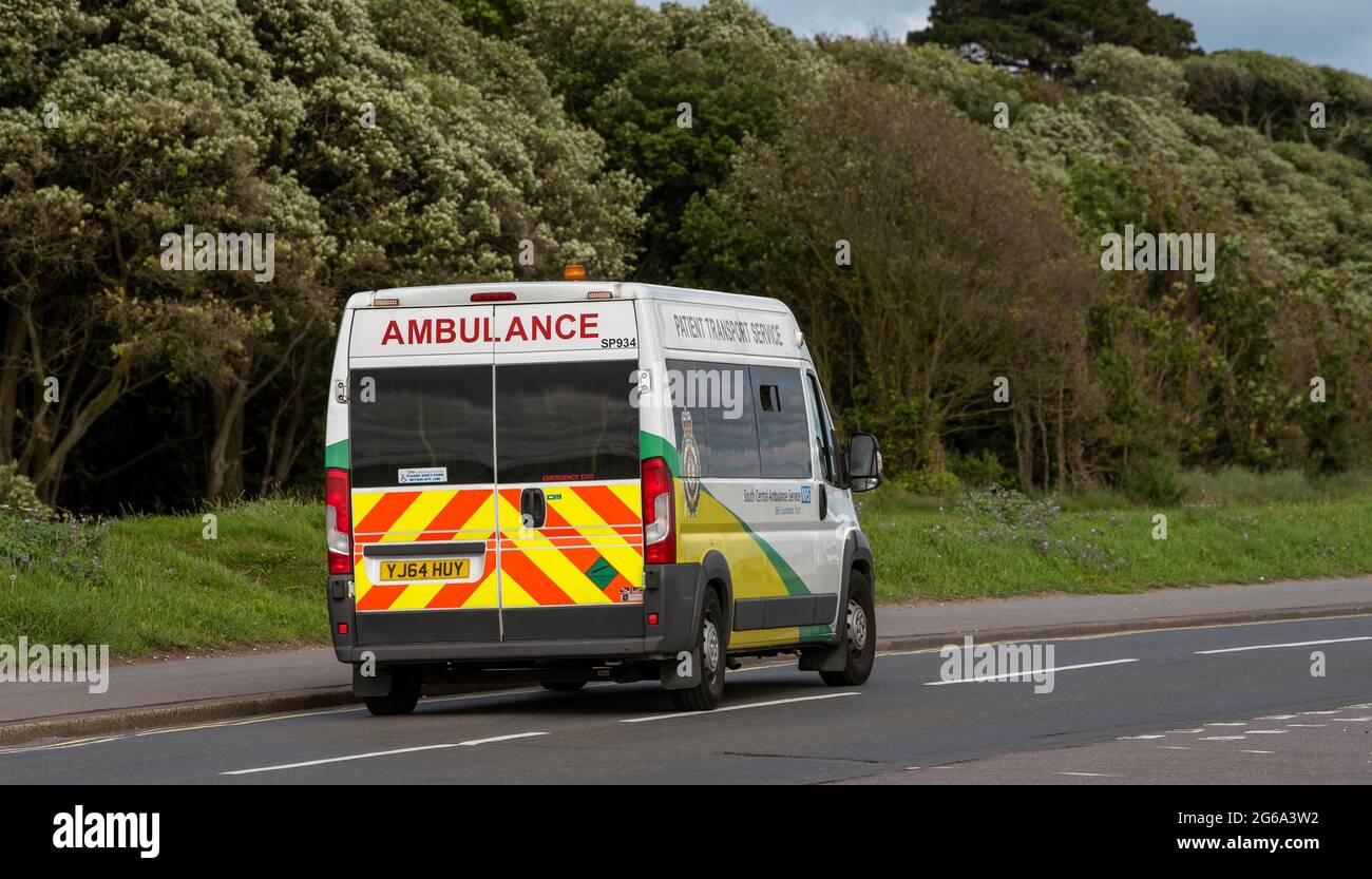 Emergency vehicles on a tree lined road hi-res stock photography and ...