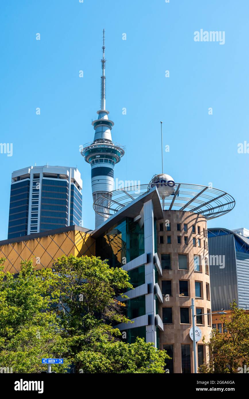 Old skyscrapers in downtown Auckland and the Skytower in the background ...