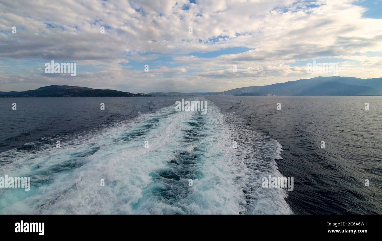 Cruise ship track with calm sea and cloudy sky in the early morning at ...
