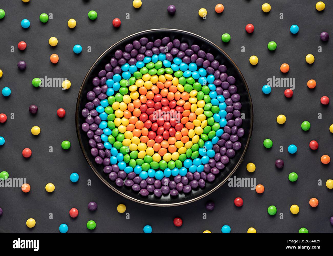 Abstract photography of a rainbow in a plate, sweets, pride flag color ...