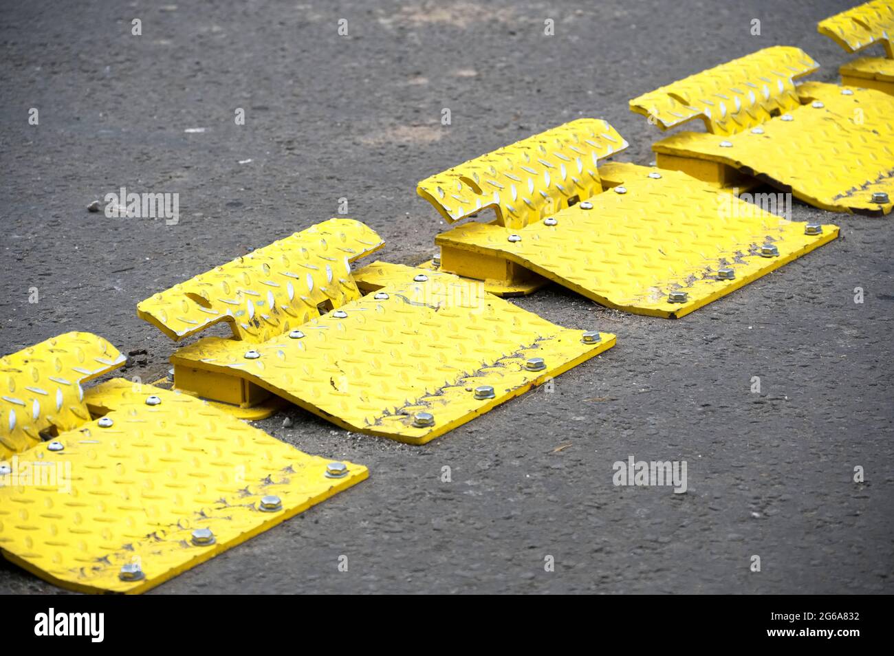 Yellow flow traffic control plates for one way direction of cars Stock ...