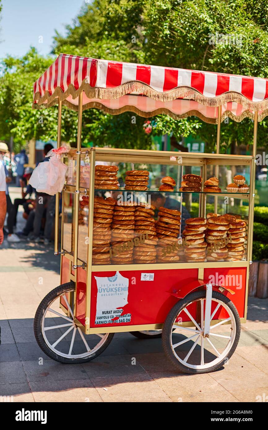 Simit street mobile counter with bagels in Turkey. Fresh baked goods ...