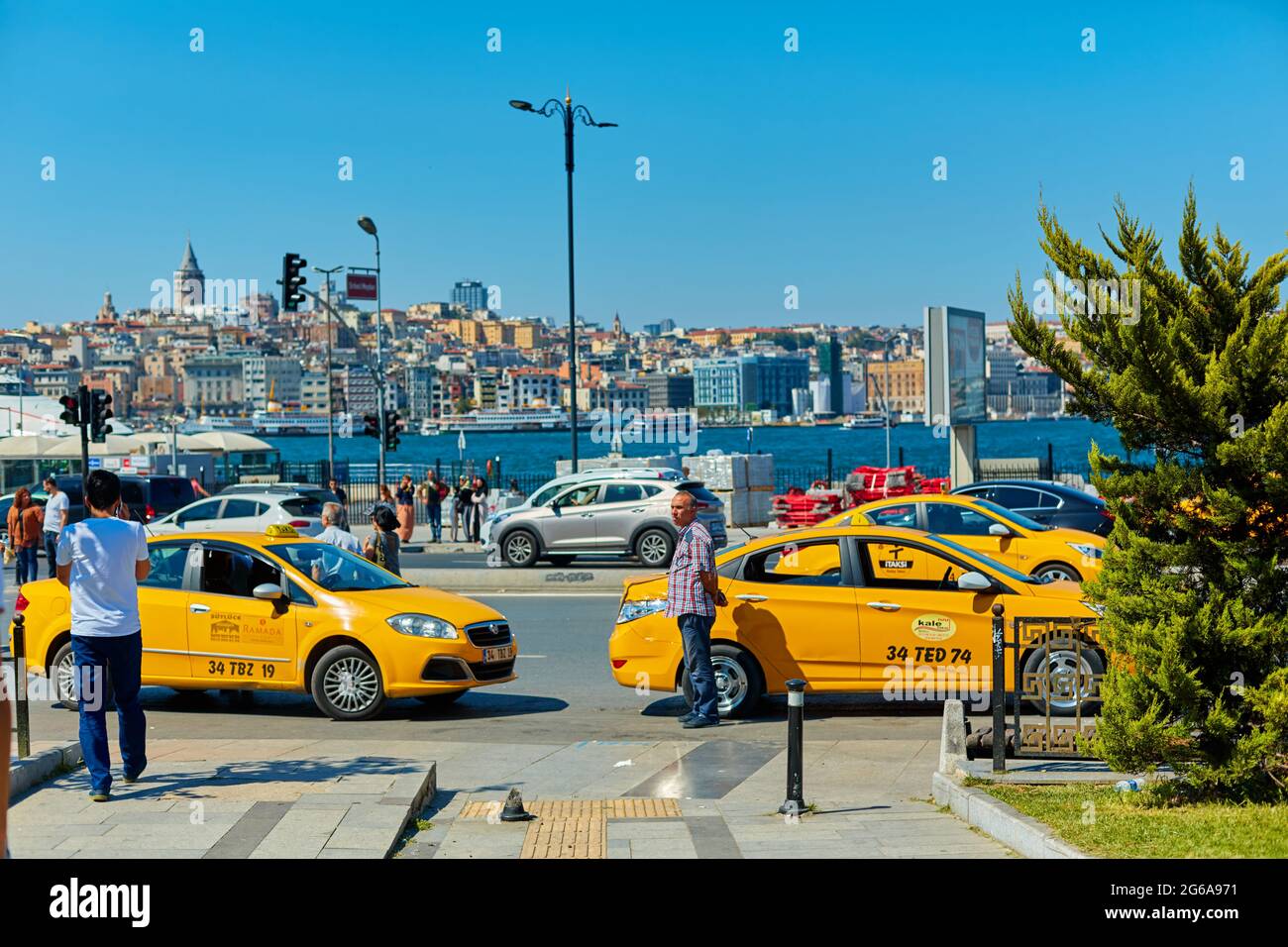 Yellow taxi car on a city street in Istanbul. Istanbul, Turkey - 28.07. ...