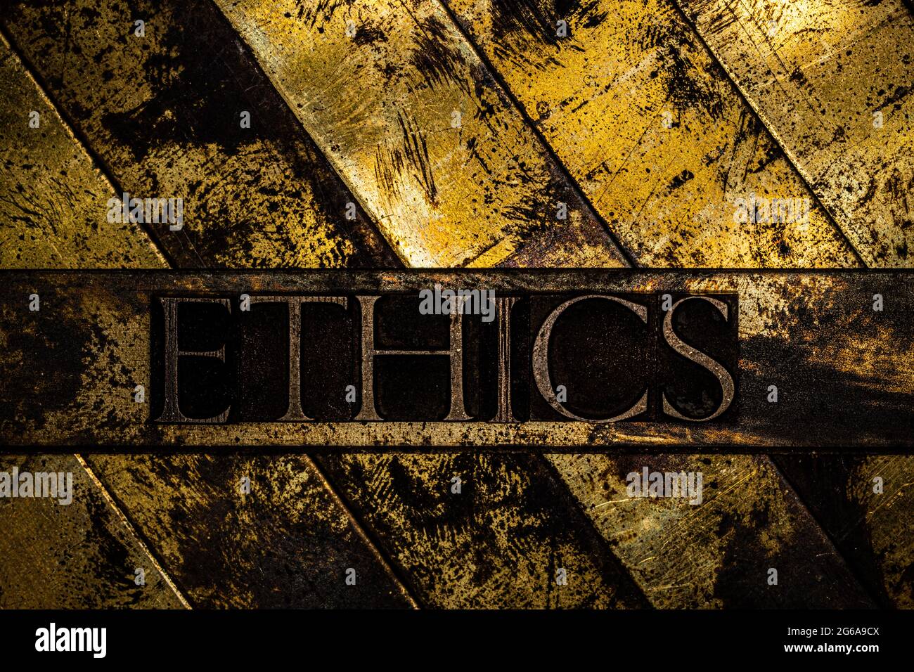 Ethics text on vintage textured copper and gold background Stock Photo ...