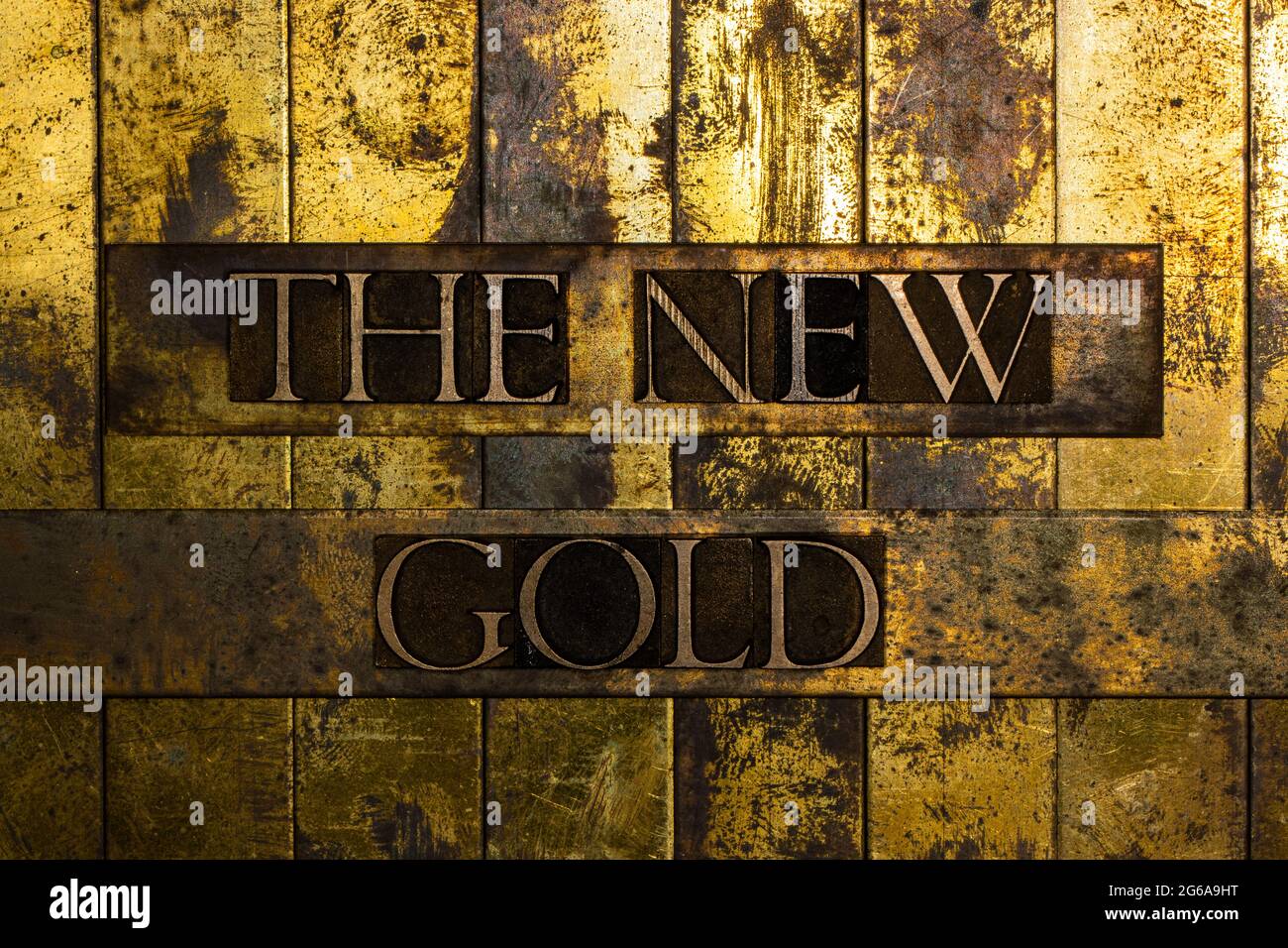 The New Gold text on textured grunge copper and vintage gold background ...