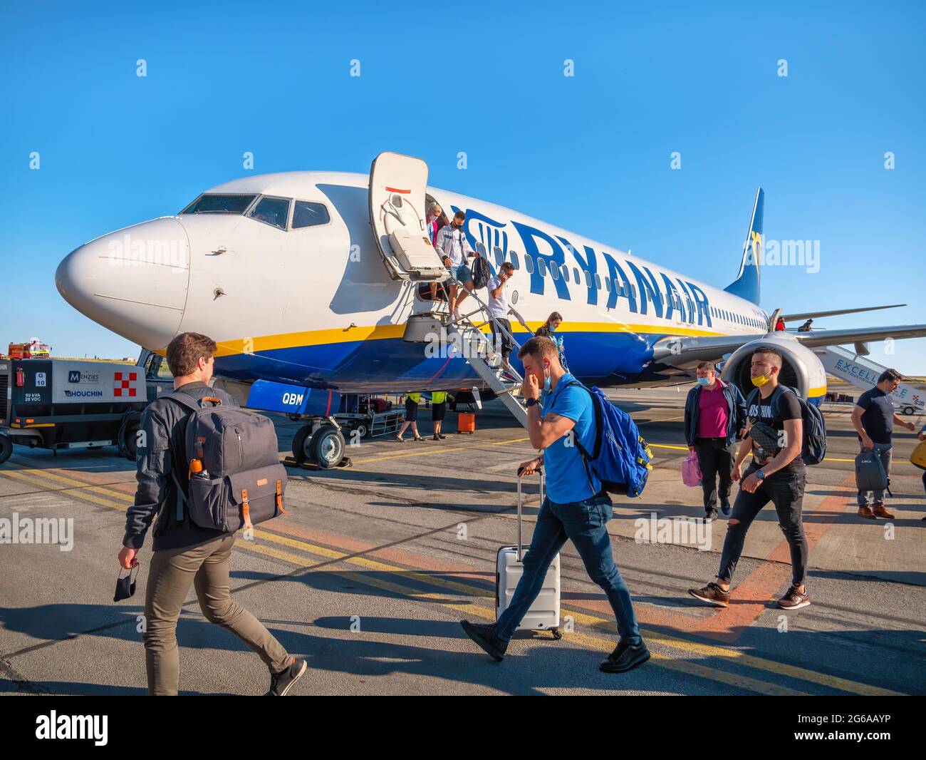Timisoara, Romania - 06.19.2021: People getting off from a Ryanair ...
