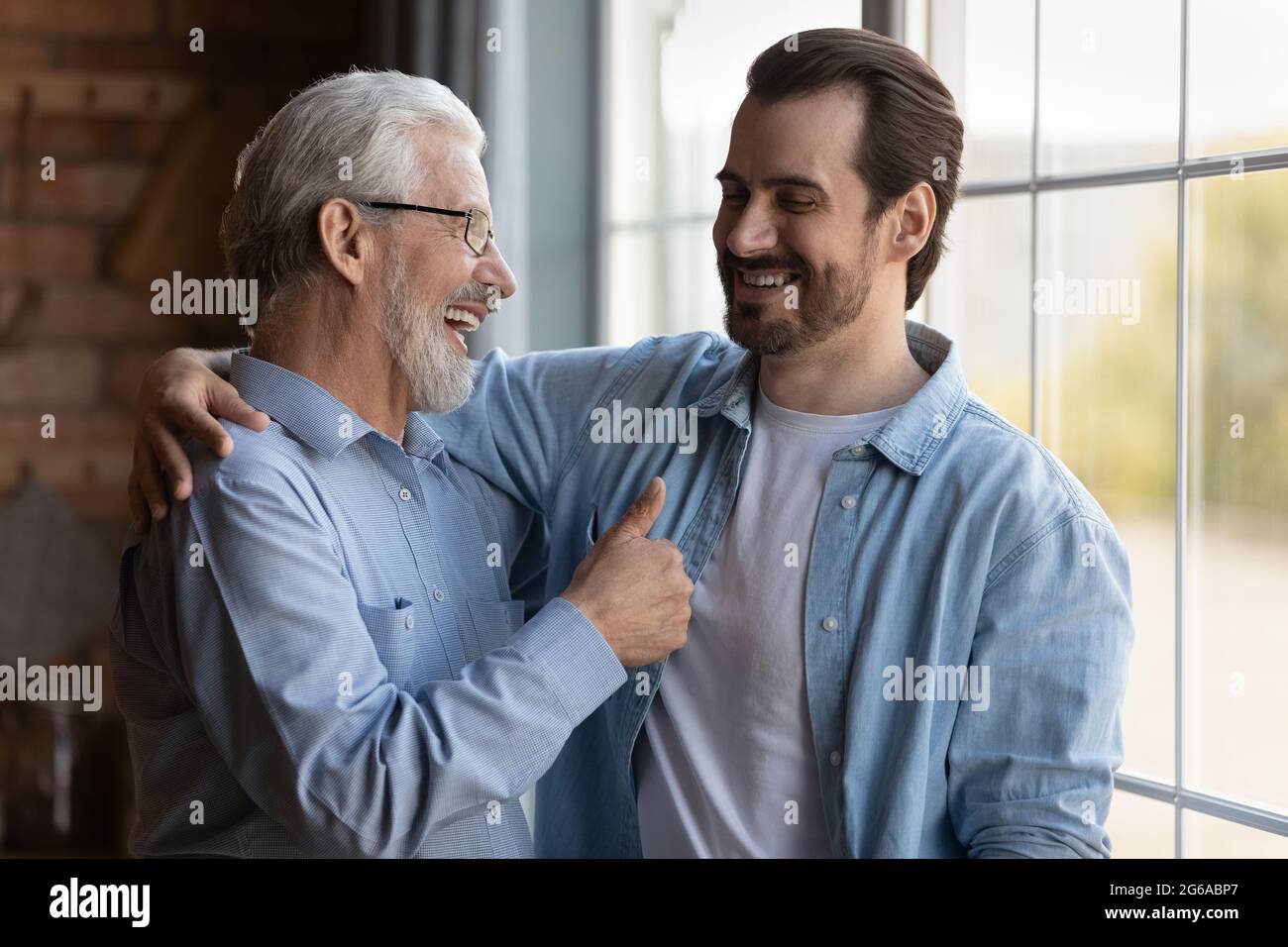 Happy proud mature older father expressing approval Stock Photo - Alamy