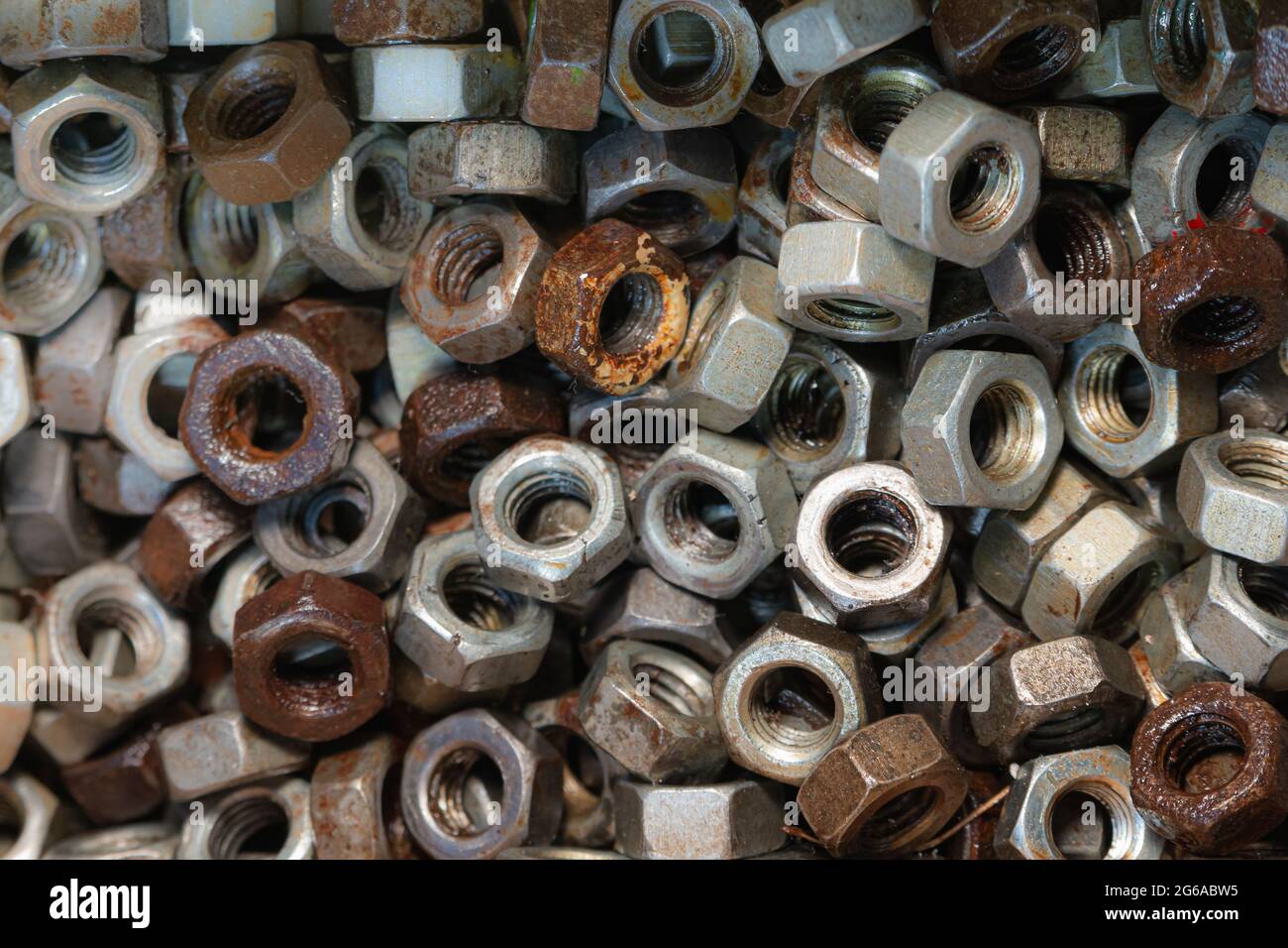 Many old used screw-nuts background, dark shining nuts Size 16mm Stock ...
