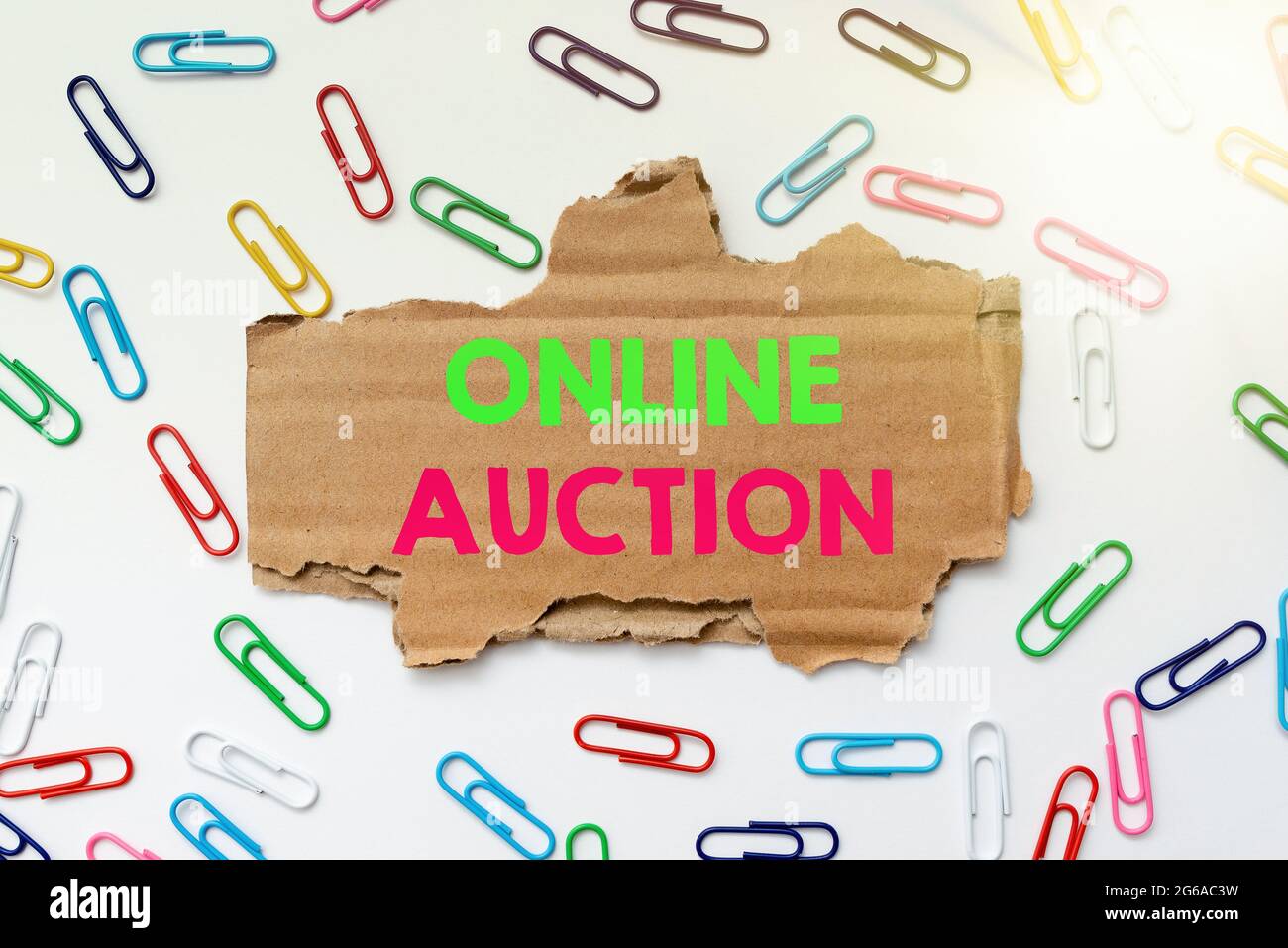 Hand writing sign Online Auction. Word Written on digitized sale event ...
