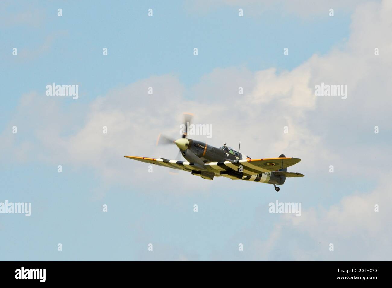 Second World War Supermarine Spitfire airborne and making high speed ...