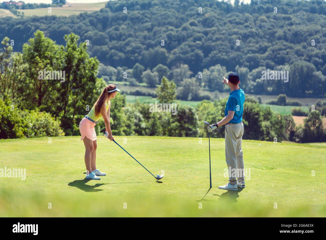 Golfing couple on golf course hi-res stock photography and images - Alamy