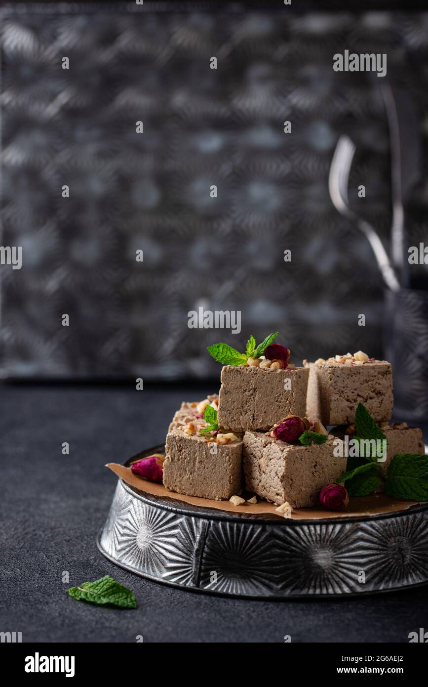 Halva with rose petal and nuts Stock Photo - Alamy