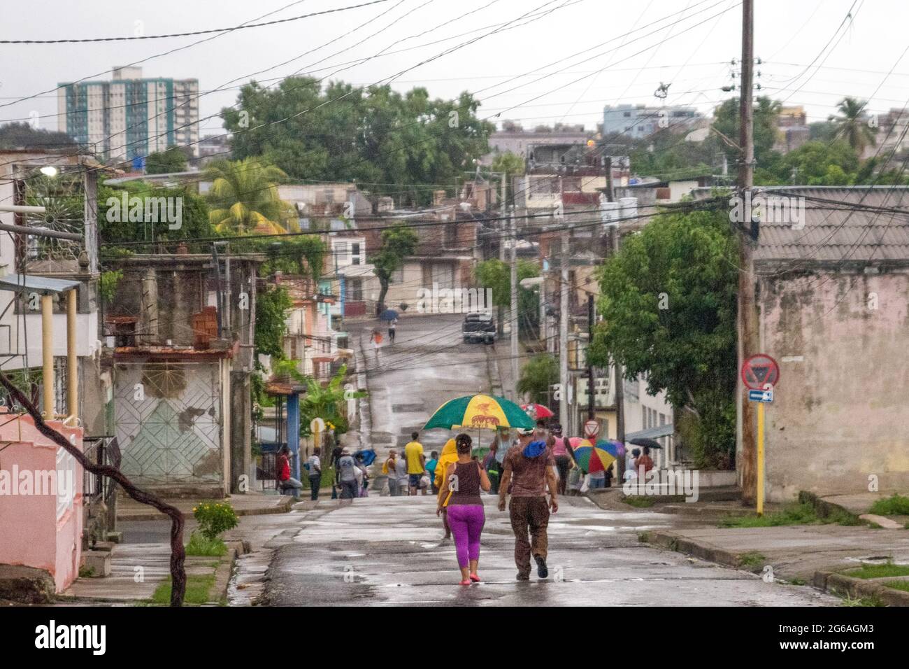 Cuban people lining up after the danger of hurricane Elsa had passed ...