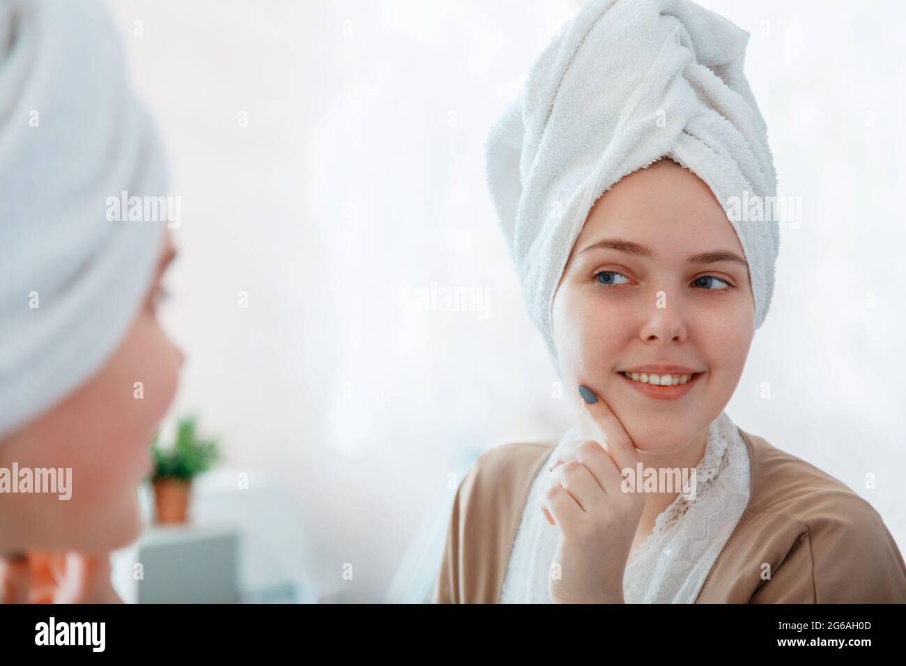 Self Care as part of morning bathroom routine. Portrait of smiling ...