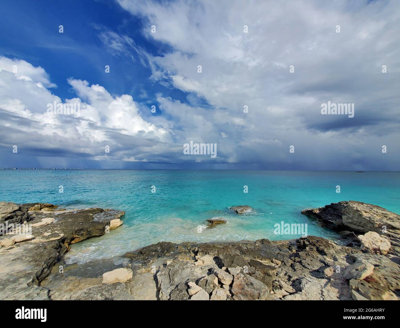 Crystal clear water amidst rocks and sandy beaches of North Bimini's ...