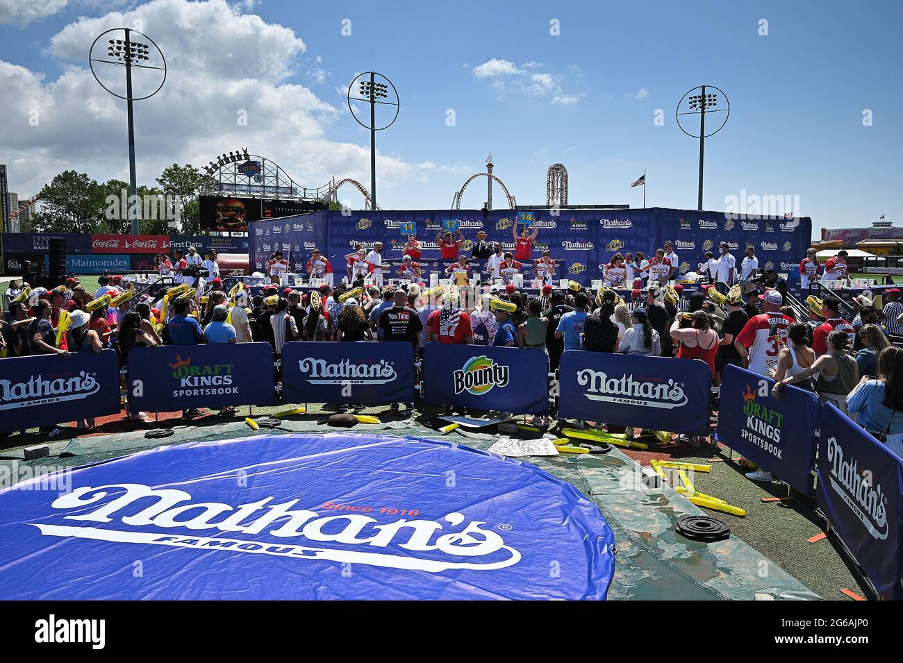 Competitive eaters in the women’s division participate in the 2021 ...