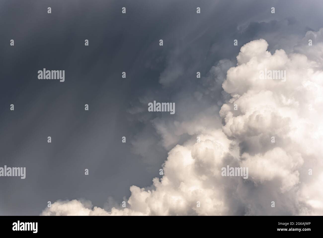 huge storm cloud, tower cumulus and cumulonimbus cloud Stock Photo - Alamy