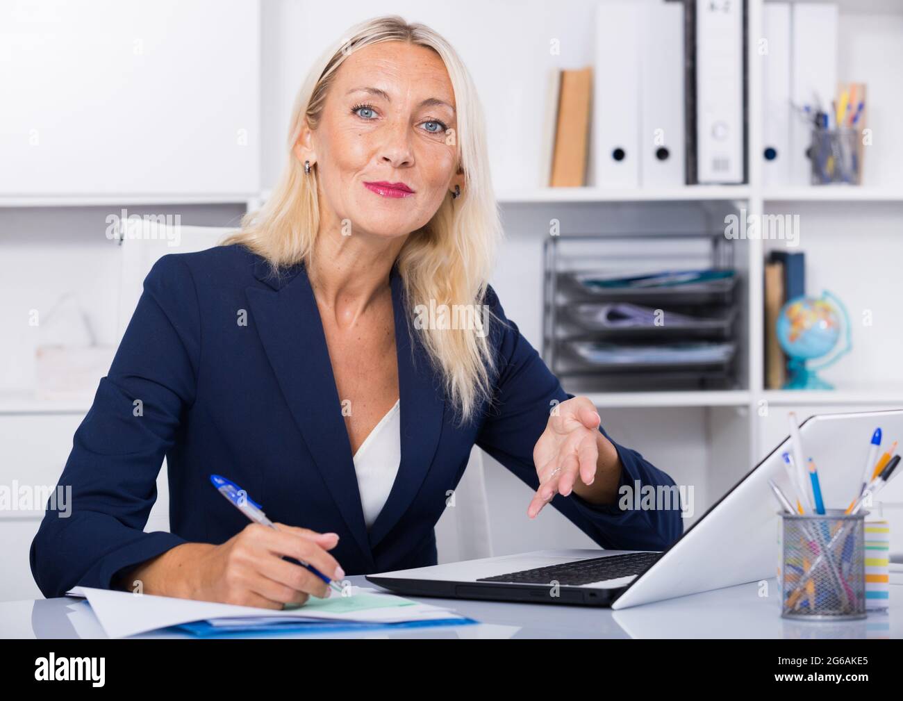 Successful business woman at workplace Stock Photo - Alamy