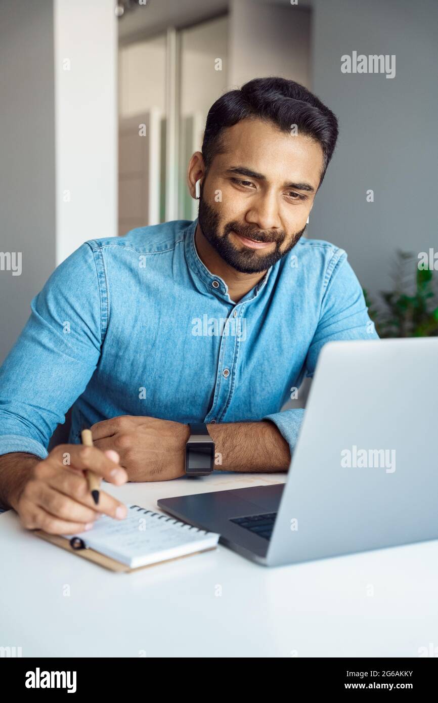 Indian man using laptop hi-res stock photography and images - Alamy