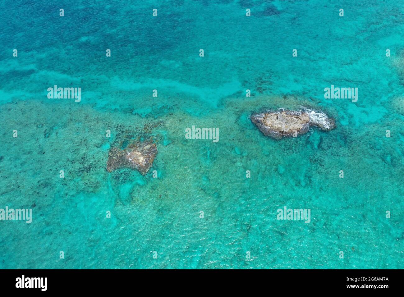 Aerial view of coral rocks off North Bimini, Bahamas on sunny summer ...