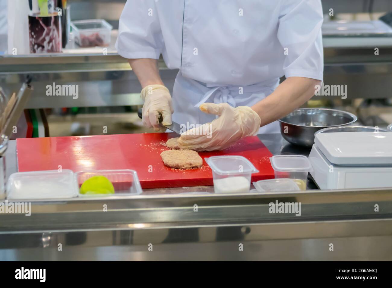 Chef hands preparing breaded minced meat burger cutlet - close up Stock ...
