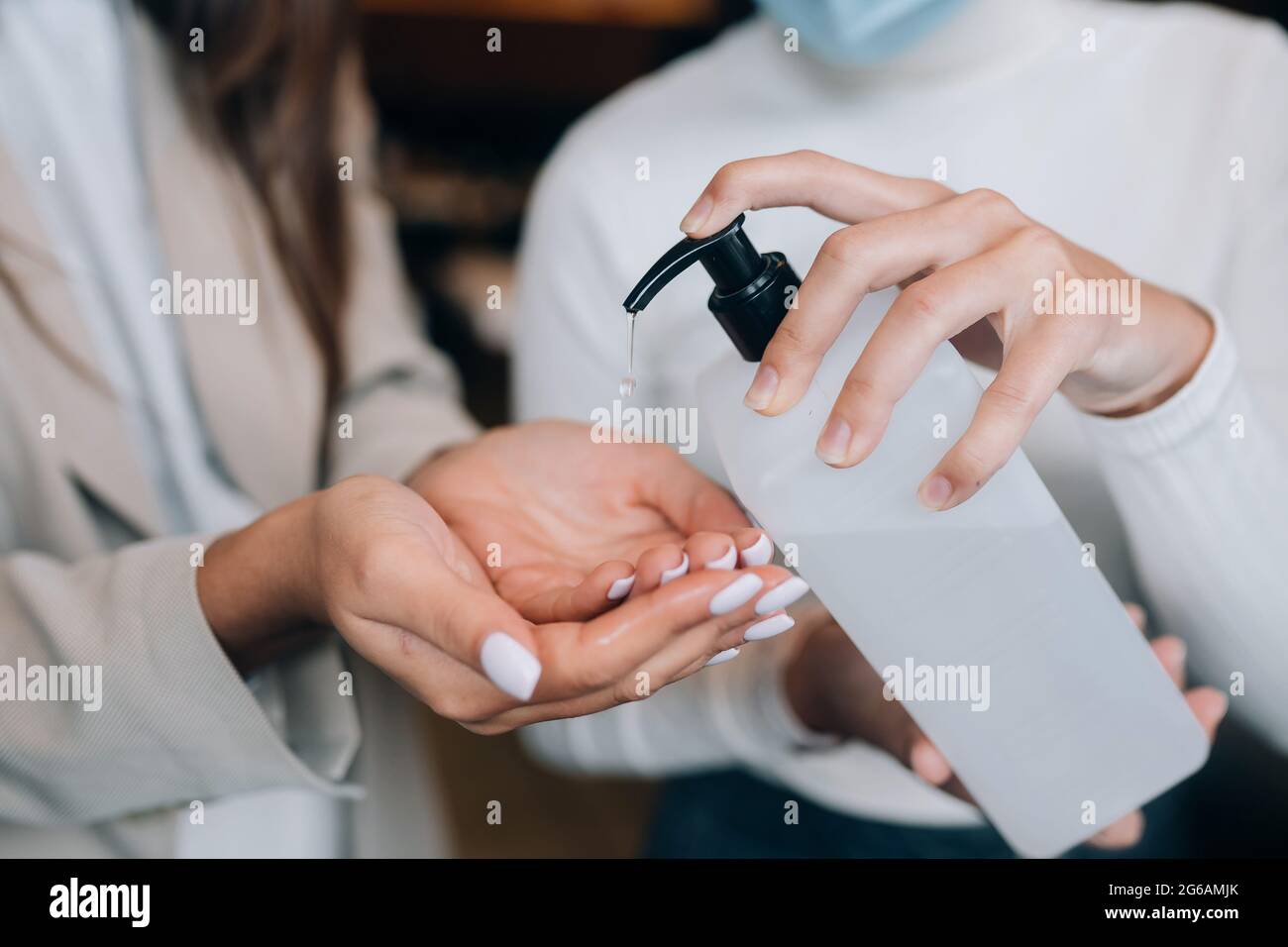 Female hands applying antibacterial liquid soap close up Stock Photo ...