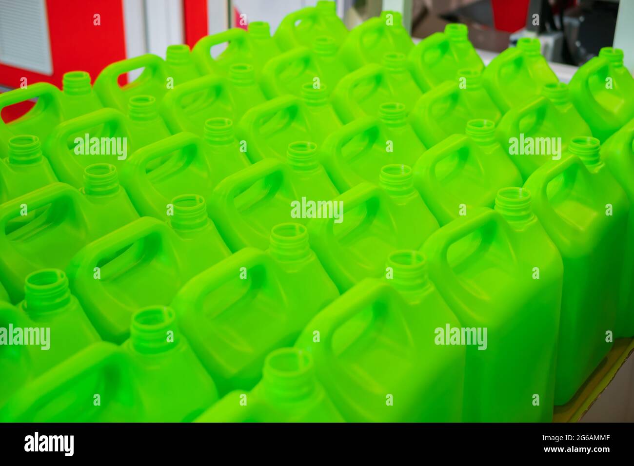 Many empty green plastic jerrycans Stock Photo - Alamy