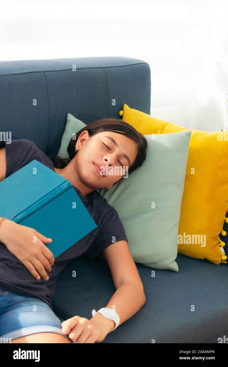 Tired woman sleeping reading hi-res stock photography and images - Alamy