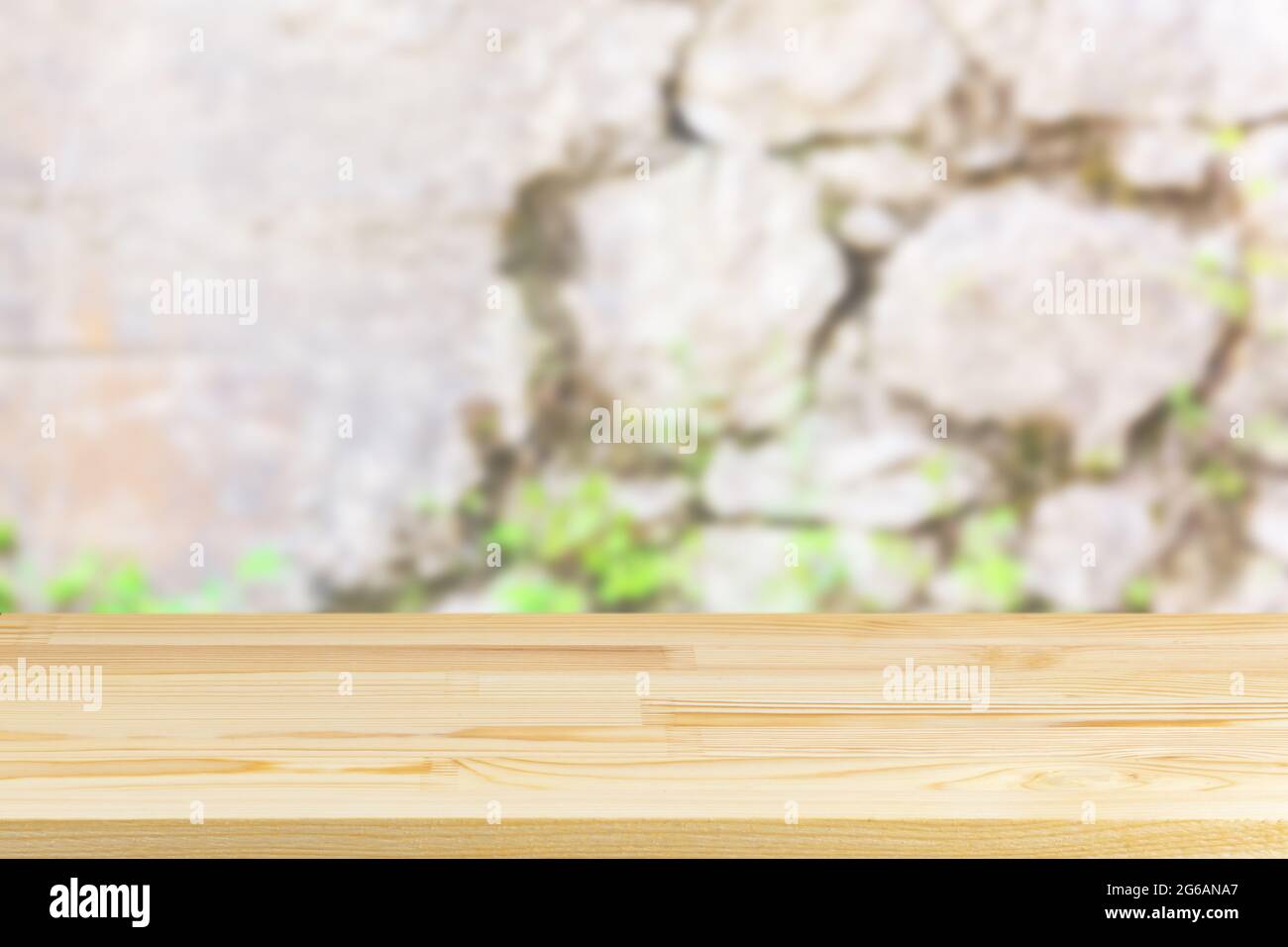 wood table top on blur stone wall background Stock Photo - Alamy