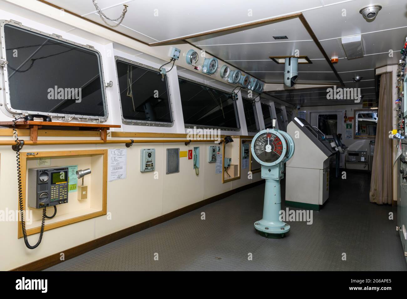 Navigational bridge on big cargo ship. Wheelhouse on vessel Stock Photo ...