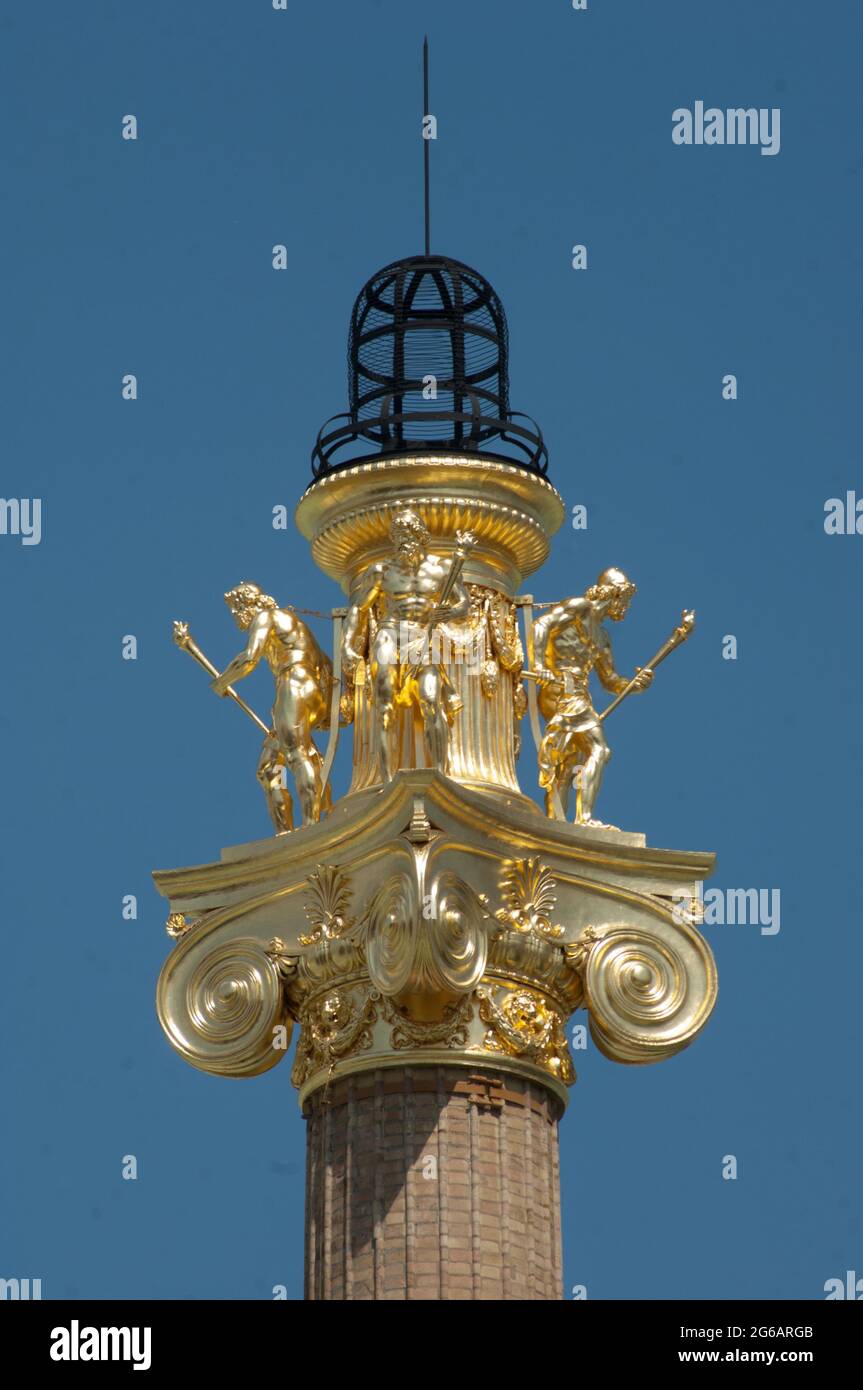 Chimney column with gilded sculptures Stock Photo - Alamy