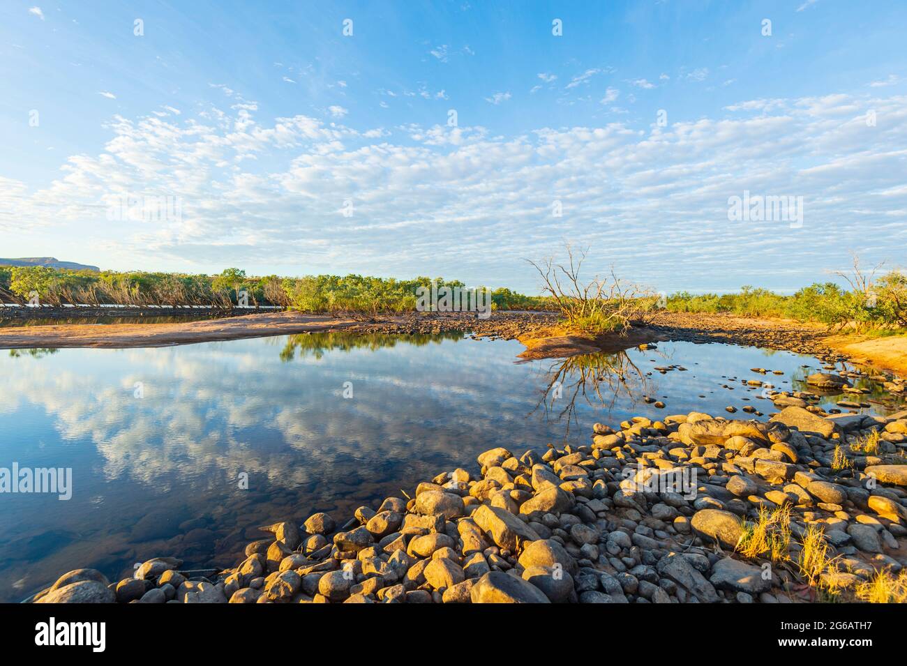 Clouds reflected in the water at sunrise at the iconic Pentecost ...