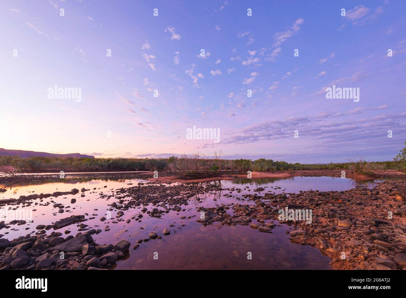 Ethereal pink sunrise at the iconic Pentecost Crossing, Gibb River Road ...